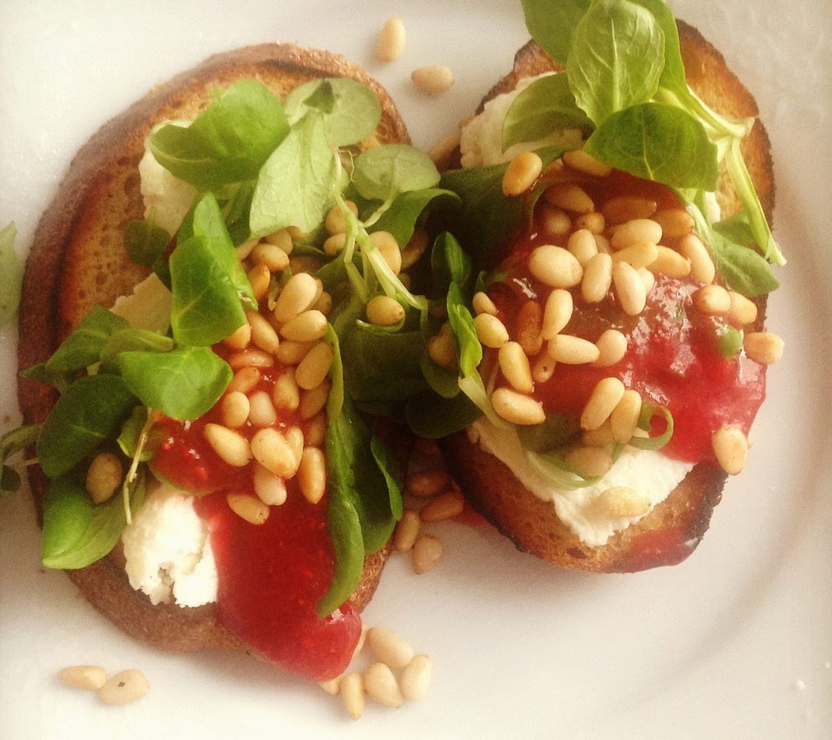 Rye toast with goat cheese, berry sauce and pine nuts - Siberian Pine ...
